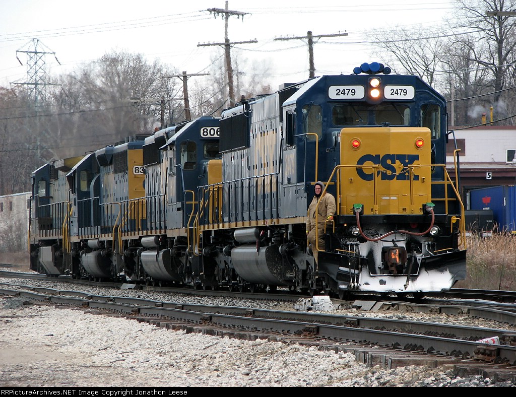 CSX 2479 has it's markers lit as Q326 backs to the house